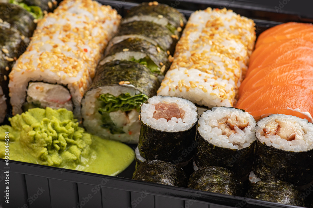 Japanese sushi food. Maki ands rolls with tuna, salmon, shrimp, crab ...