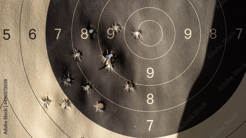 Bullet marks on paper targets. Image for background. Stock Photo ...