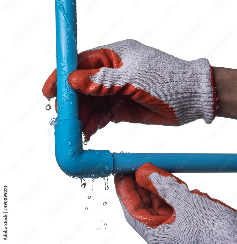 Foto de Man's hand holding blue pvc plastic pipe with a broken ...
