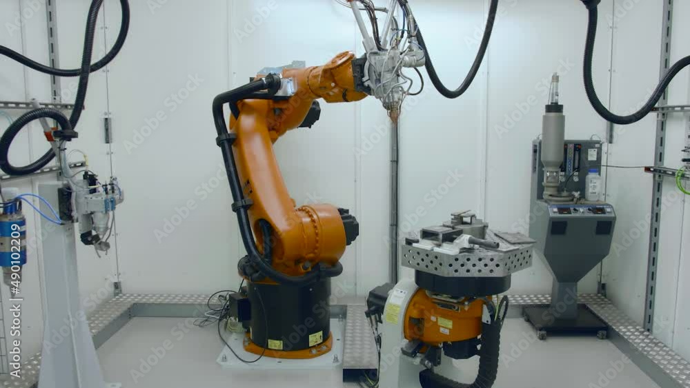 Robot arm equipped with laser for metalworking in engineering ...