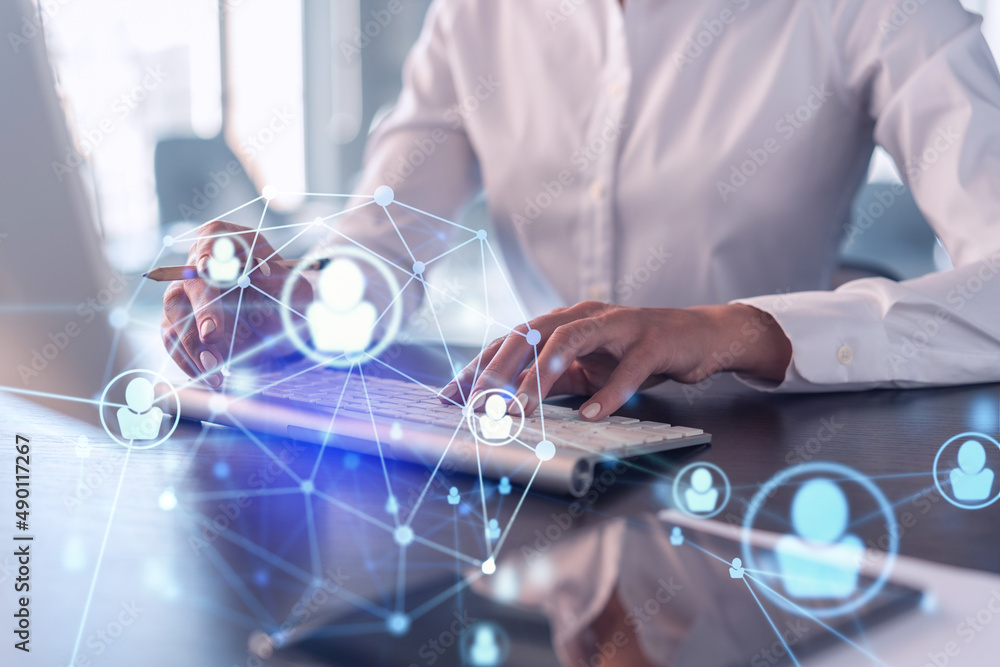 HR woman specialist is typing the keyboard in the internet to find the ...