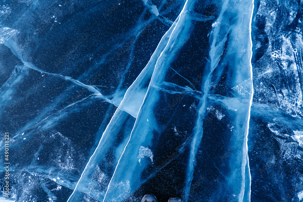 Ice texture photo. Cracks in pure ice. Fragile blue transparent ice ...