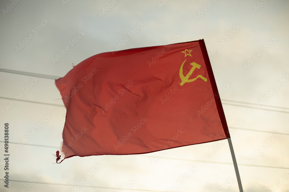 Red banner with hammer and sickle. Flag of Soviet Union. Old symbol of ...