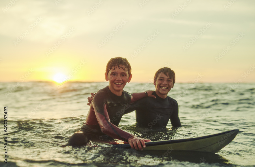 Theres nothing better than catching some waves with a friend. Portrait ...