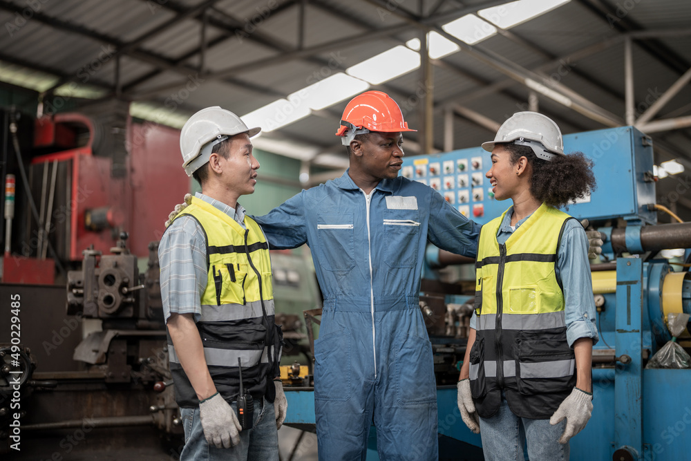 Group of Diversity factory worker people standing when success the ...