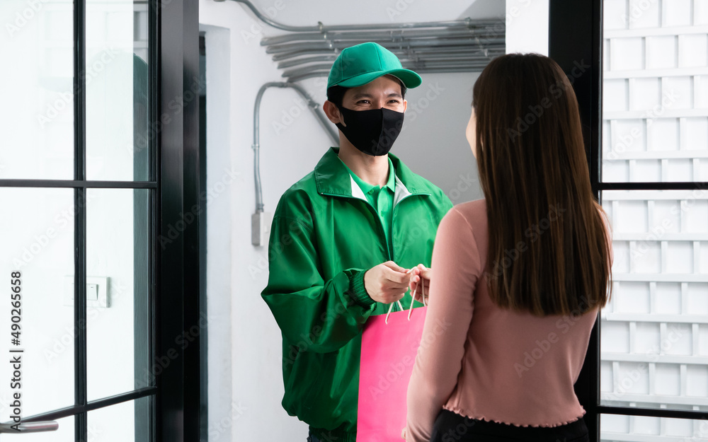 Asian delivery man send romantic present in pink paper bag from her ...