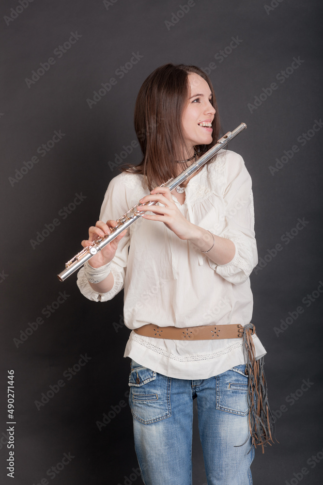 woman with a flute Stock Photo | Adobe Stock