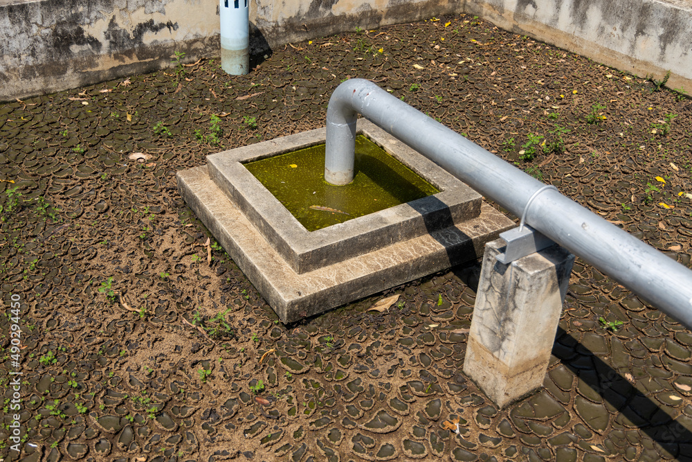 Sludge drying bed in waste-water treatment plant system, brown sand in ...