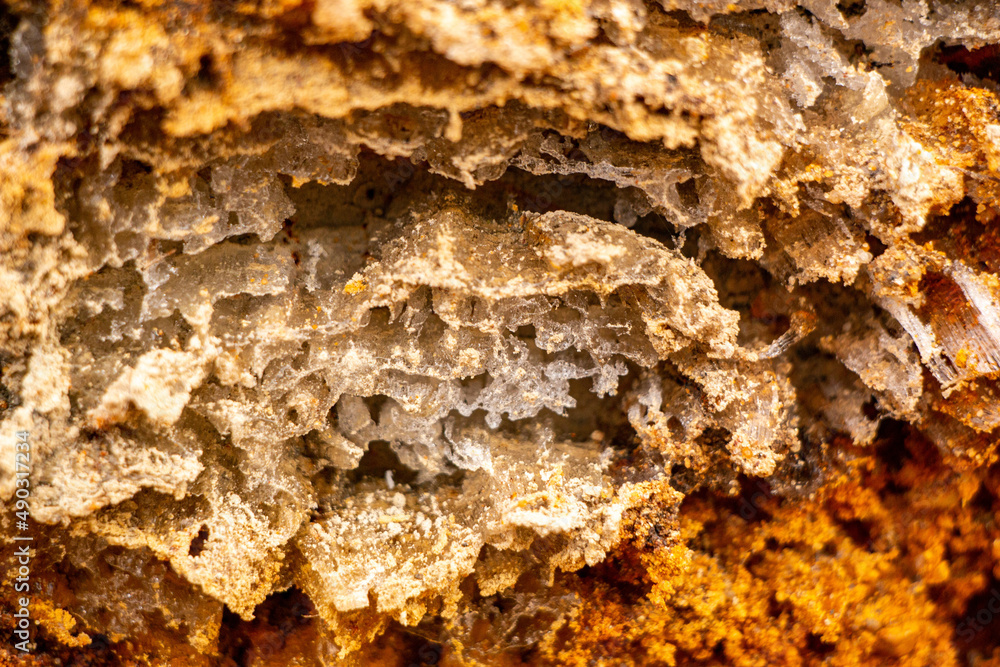 Textural sand, with relief surface, multi-colored layers and different ...