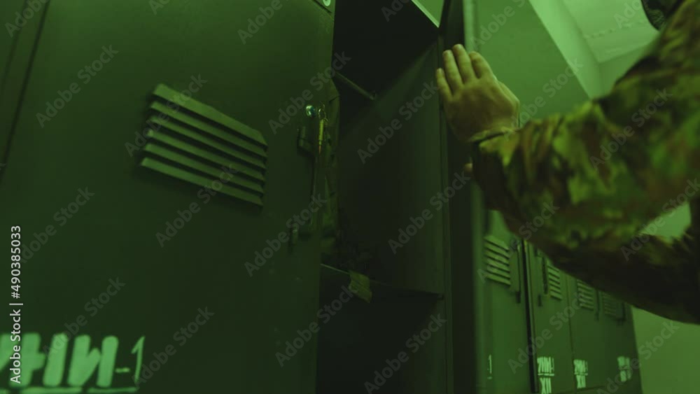 Close up view of green colored metallic military Locker Room . Soldiers ...