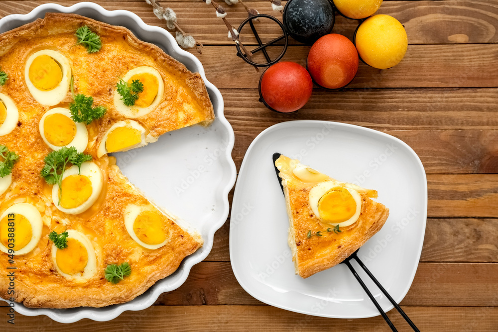 Delicious Easter tart with painted eggs on wooden background Stock ...