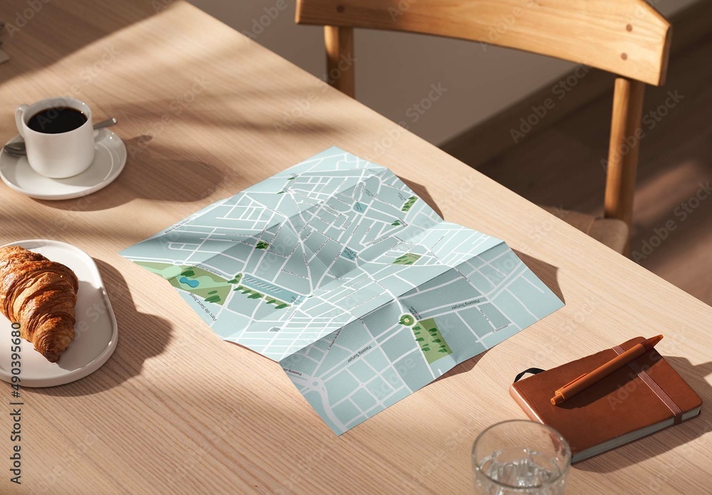 Foldable Paper Map on a Café Table Mockup Stock Template | Adobe Stock