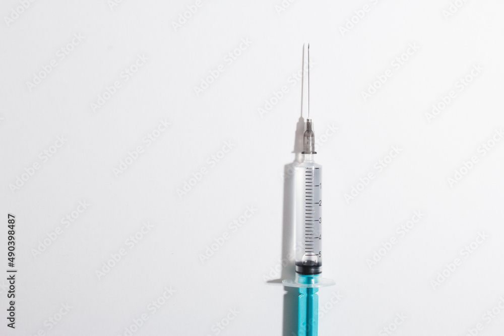 Medical syringe on a white background. A syringe for injection. The ...