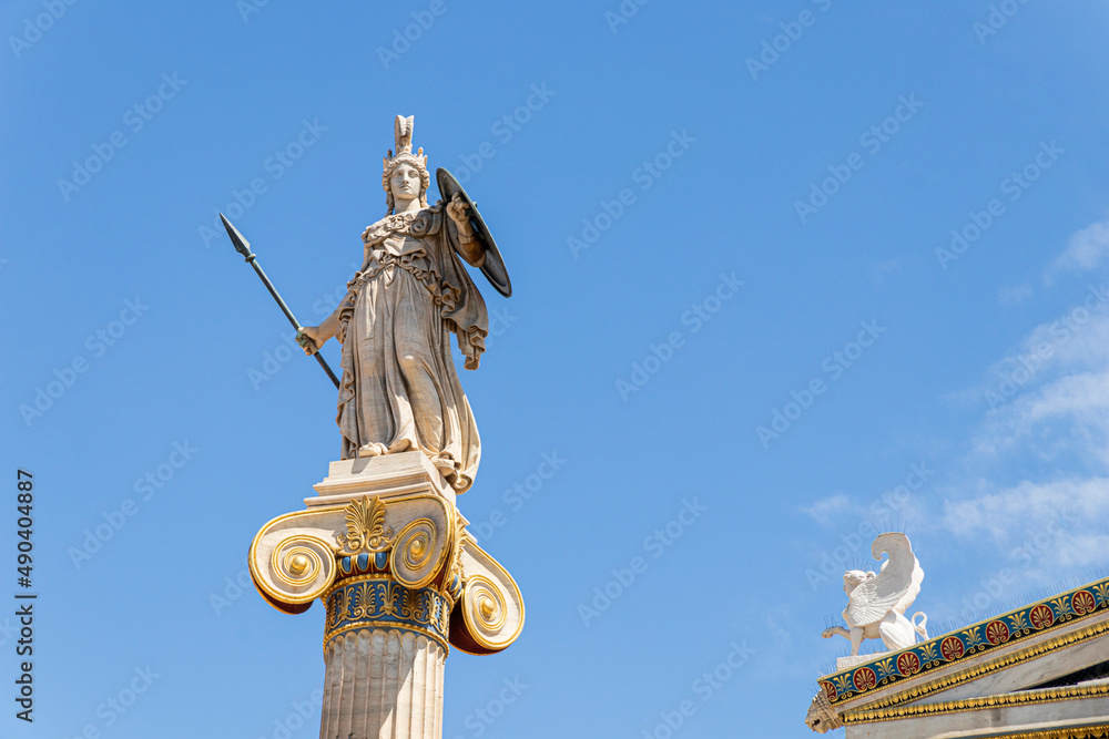 Foto de Athens, Greece. Column statue of godess Athena, one of the ...