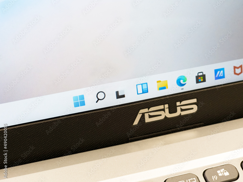 Microsoft Windows 11 operating system on an Asus laptop, start menu ...