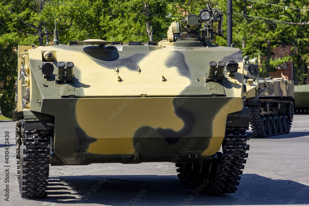 Russian military vehicles on the city square. Russian modern military ...