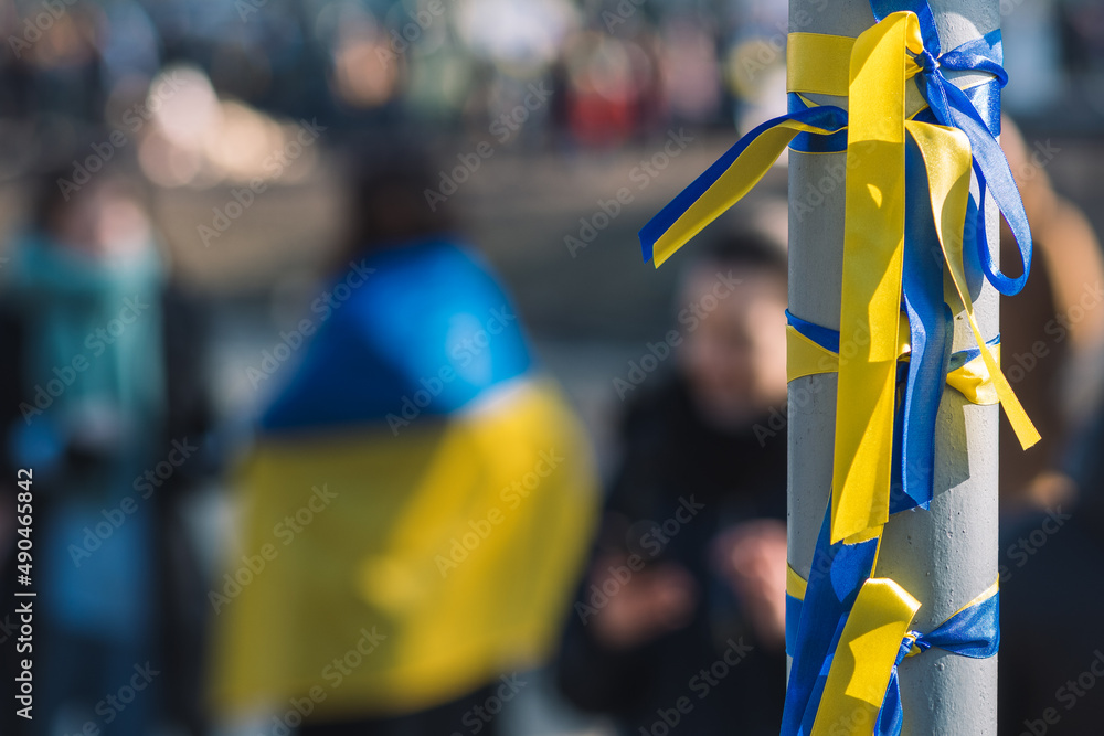 Ribbons with colors of Ukraine during a peaceful demonstration against ...