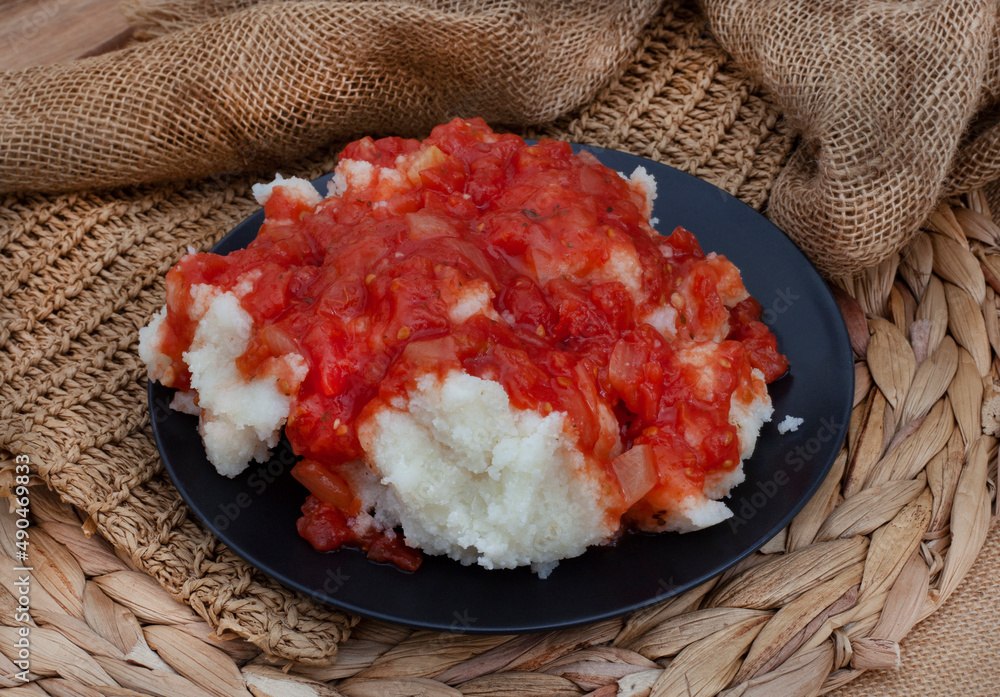 Traditional South African Pap and sous, maize meal covered in tomato ...