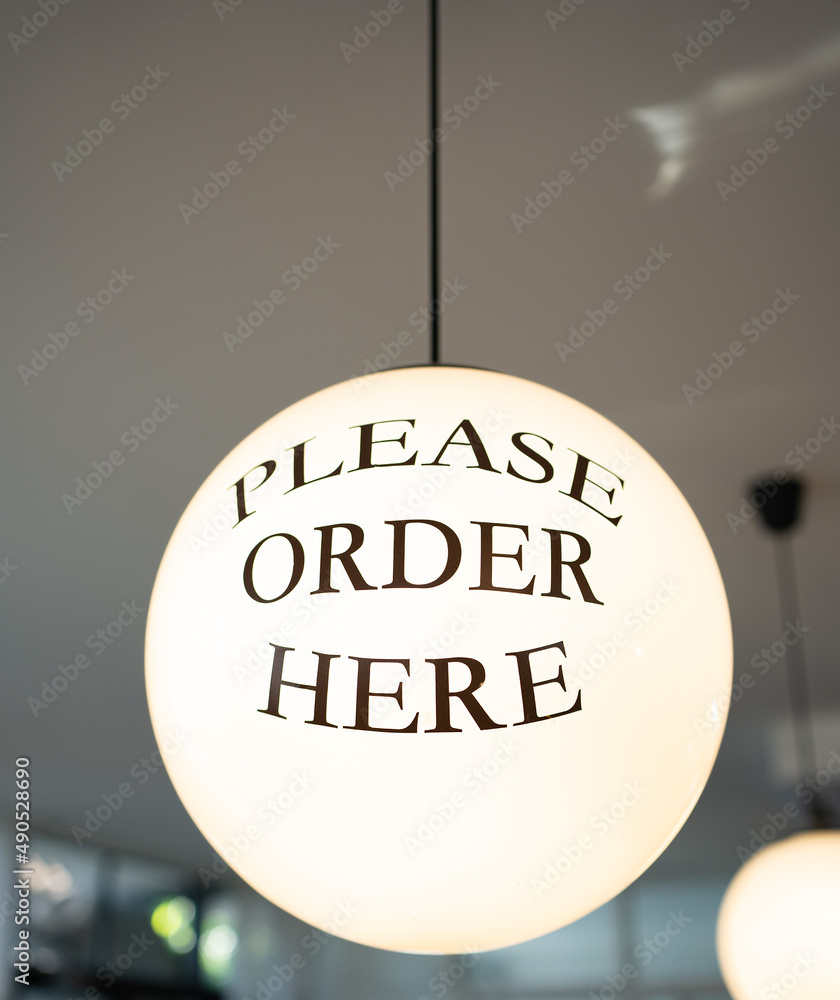 Point of purchase labels on illuminated bulbs.Please order here sign ...
