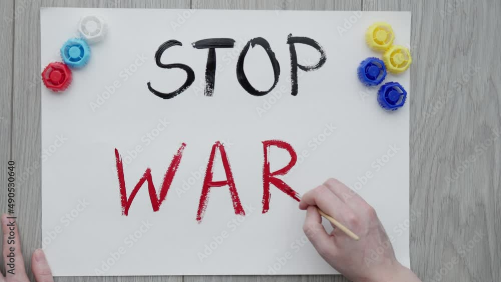 Video Stock stop war painting in black red colors paints yellow blue ...