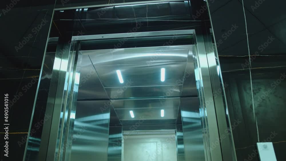 Cabin of modern passenger elevator. Digital lift scoreboard showing ...