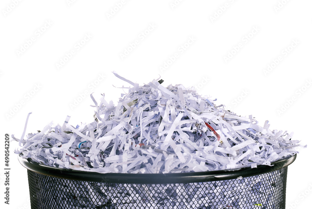 Leaving no shred of evidence. Studio shot of shredded paper in a ...