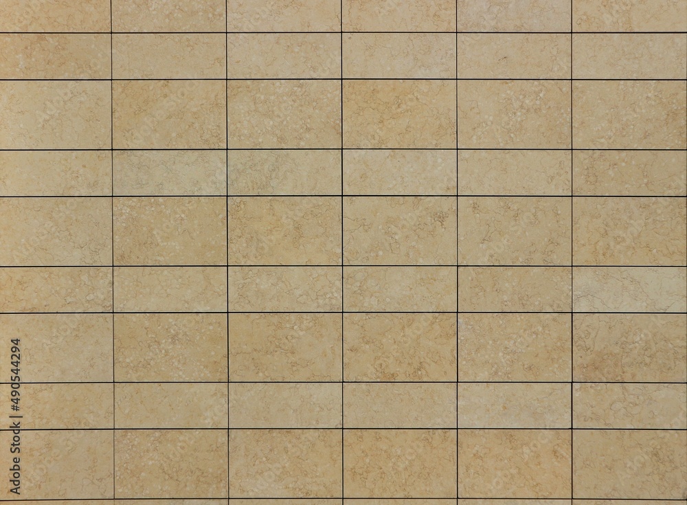 Detail of thin yellow marble ventilated facade. Elegant modern building ...