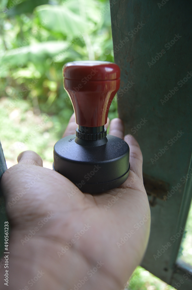 Manual stamp flash photo shot in window. close up photo. there is only ...