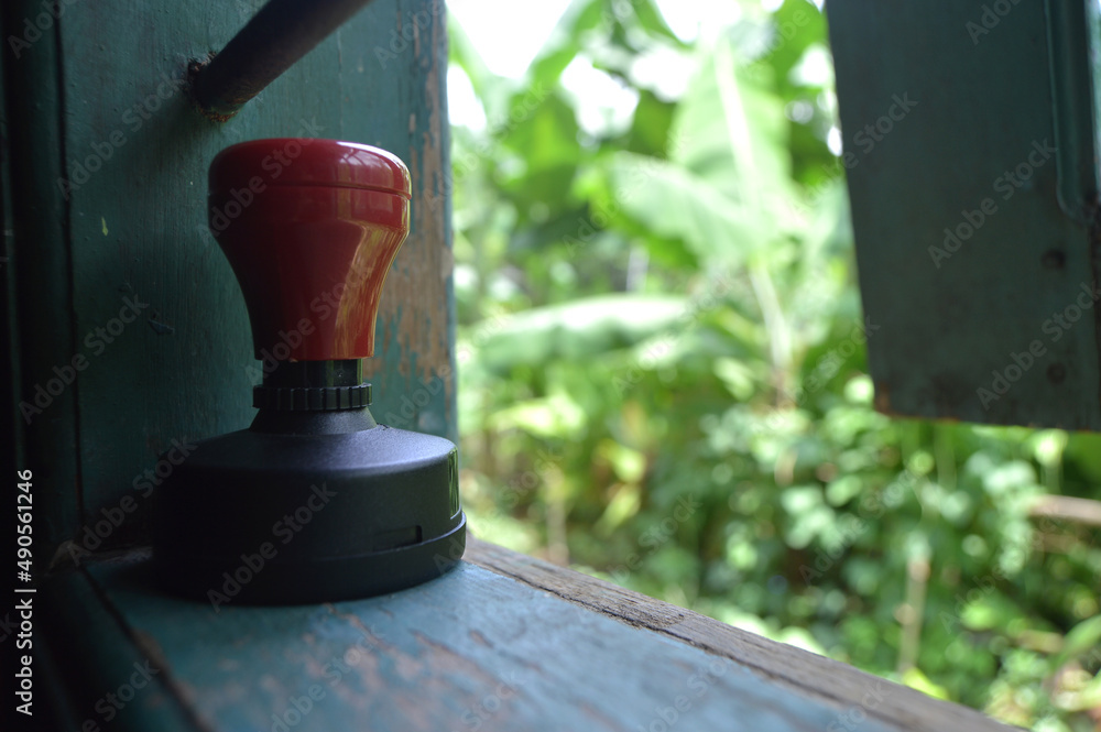 Manual stamp flash photo shot in window. close up photo. there is only ...