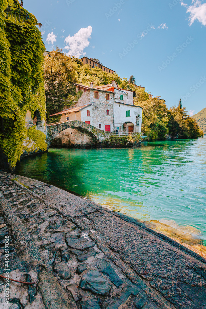 Village of Nesso with the medieval bridge, also called Civera bridge ...