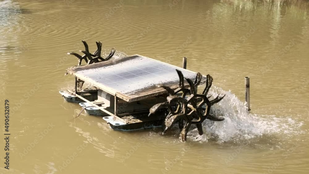Wind-powered technology by water wheel, sewage treatment turbines spin ...