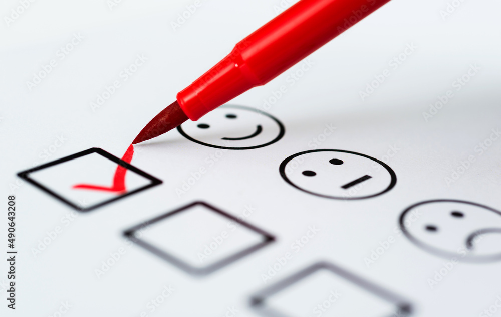 Tick placed in smiley face check box Stock Photo | Adobe Stock
