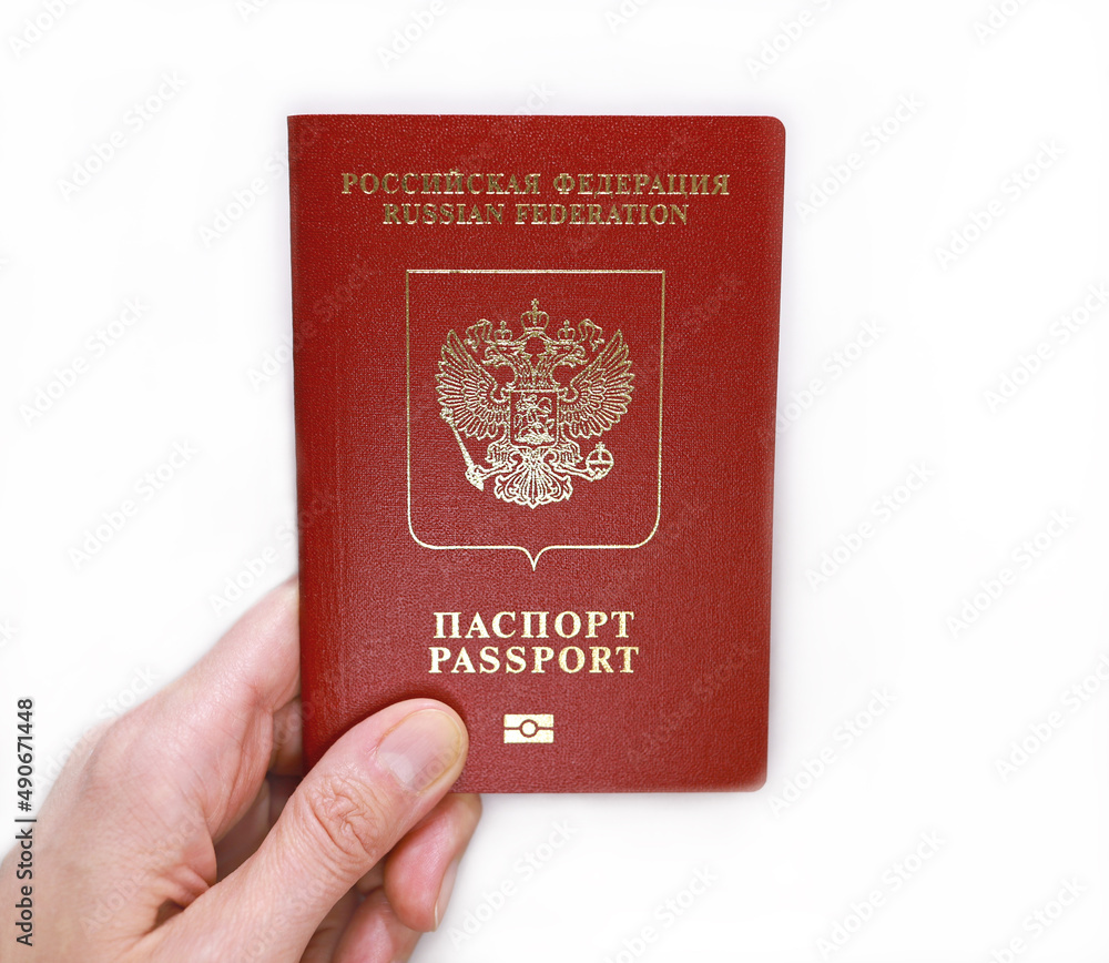 Womens Hand Holds An External Passport Of Russian Federation Escape