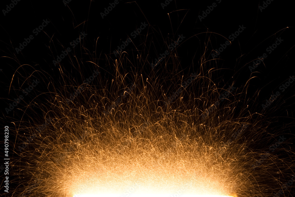 fire sparks particles on black background for overlay design, shot ...