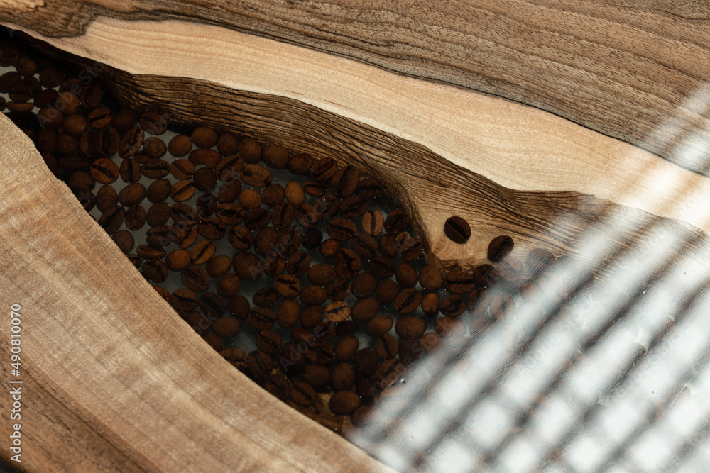 Expensive vintage furniture. The table is covered with epoxy resin and ...