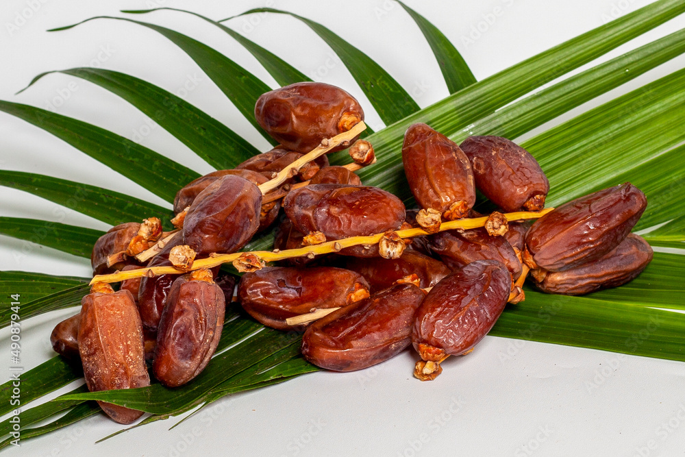 Dried dates (fruit of Phoenix dactylifera dates). Clipping paths for ...