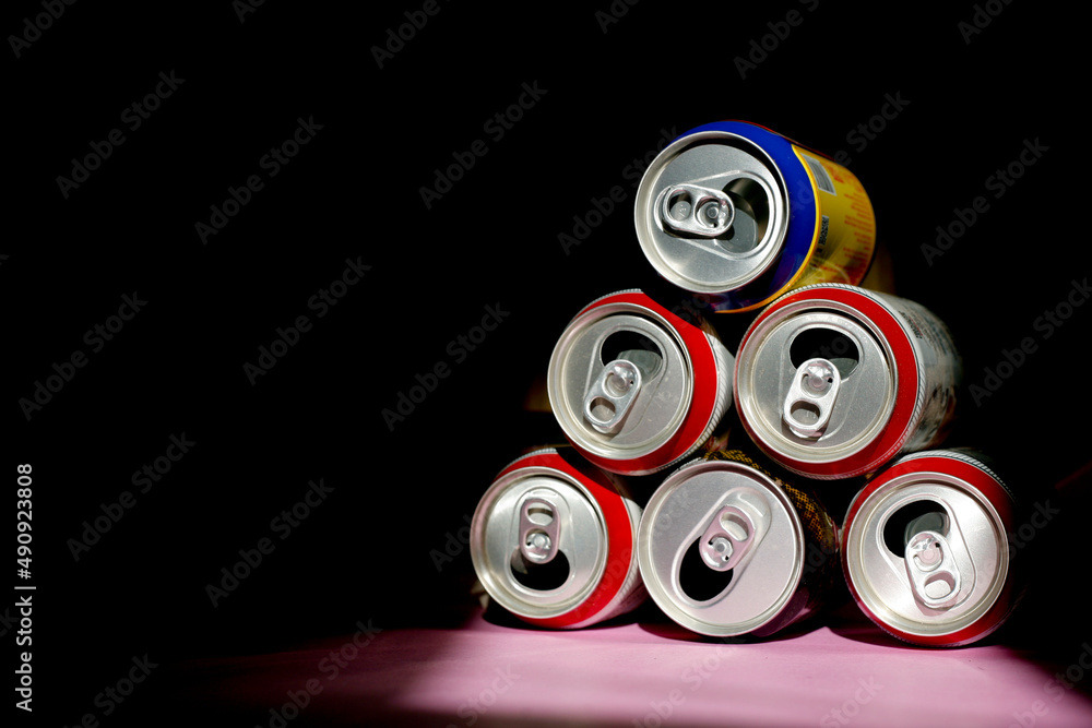 Stack of cans for reuse and recycle. Empty cans top view. Stock Photo ...