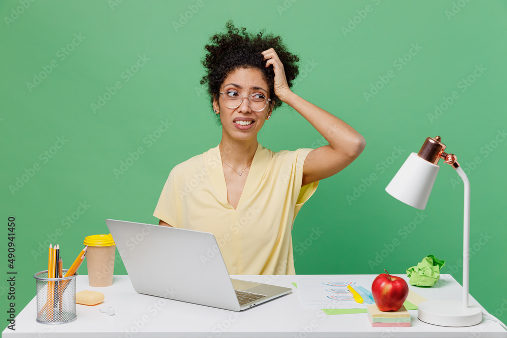 Young mistaken sad worried employee business woman of African American ...