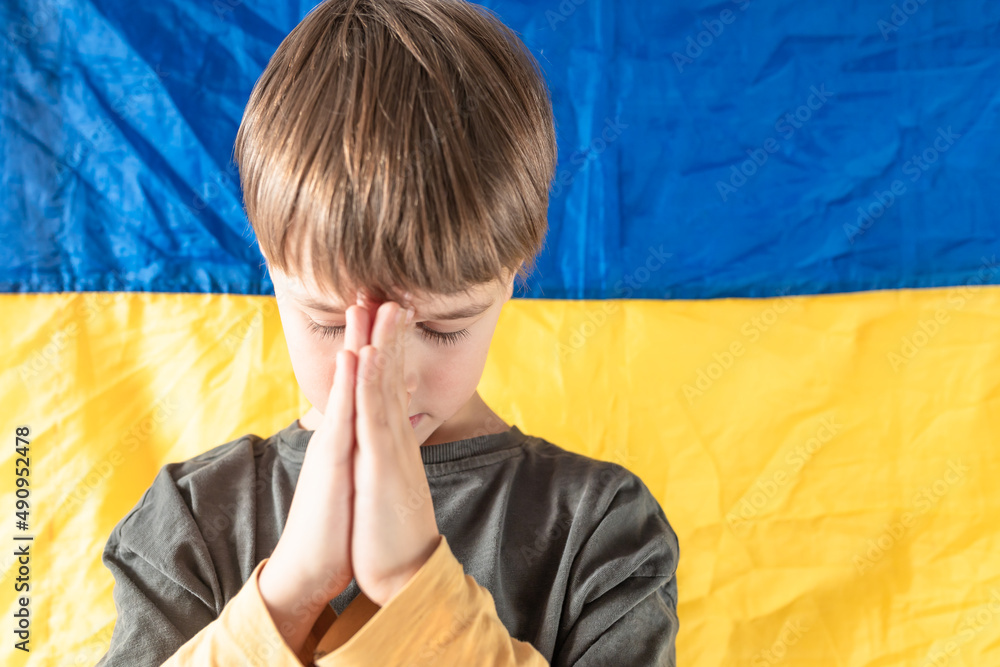 child prayer for the lives of relatives and armed forces of Ukraine. A ...