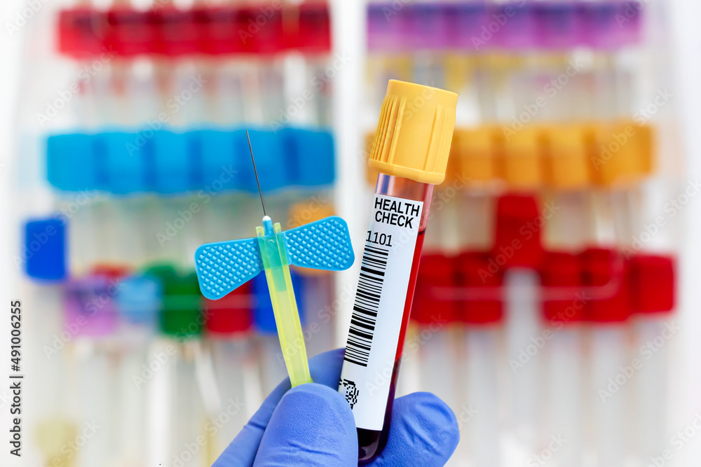 doctor with Blood tube and needle for general health check. Blood ...