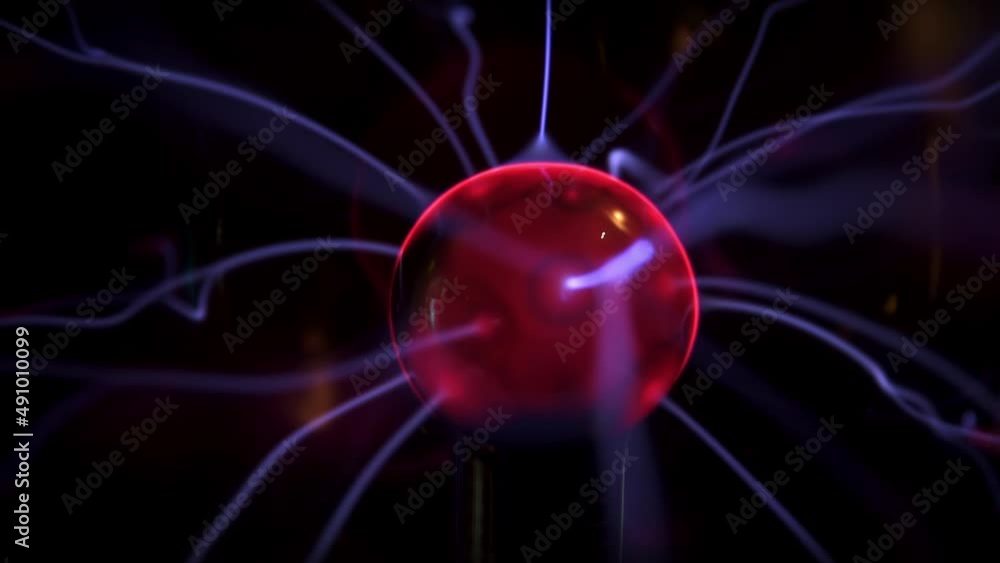Plasma ball with energy rays on dark background, Physic model of plasma ...