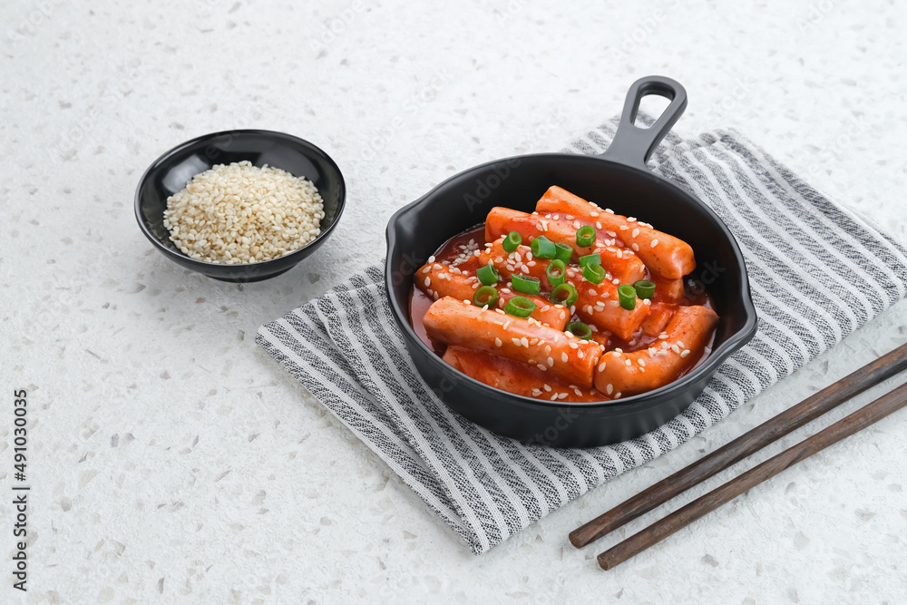 Tteokbokki or Topokki , stir fried rice cake stick, popular Korean ...