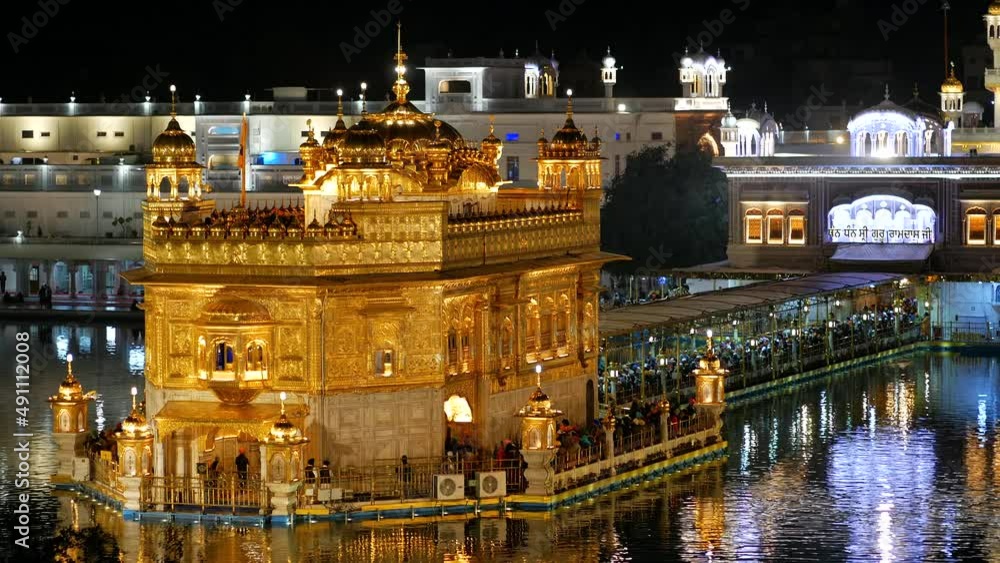 Sikh worshippers visit the Harmandir Sahib aka Golden Temple, the most ...