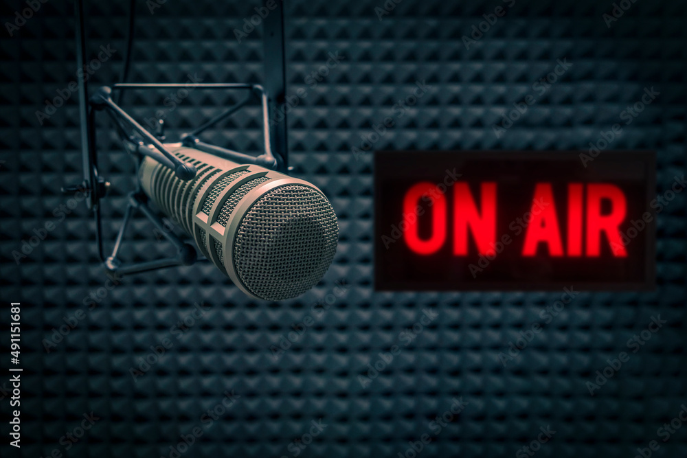 Professional microphone in radio station studio and on air sign Stock ...