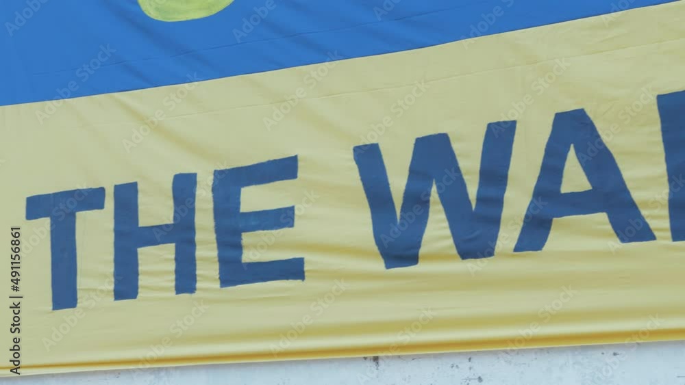 Flag of Ukraine with text 'Stop the War in protest to Russain invasion ...