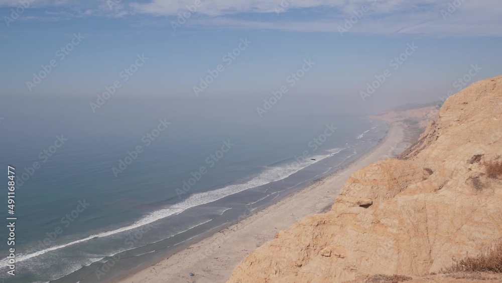 Steep cliff, rock or bluff, foggy weather, California coast erosion ...