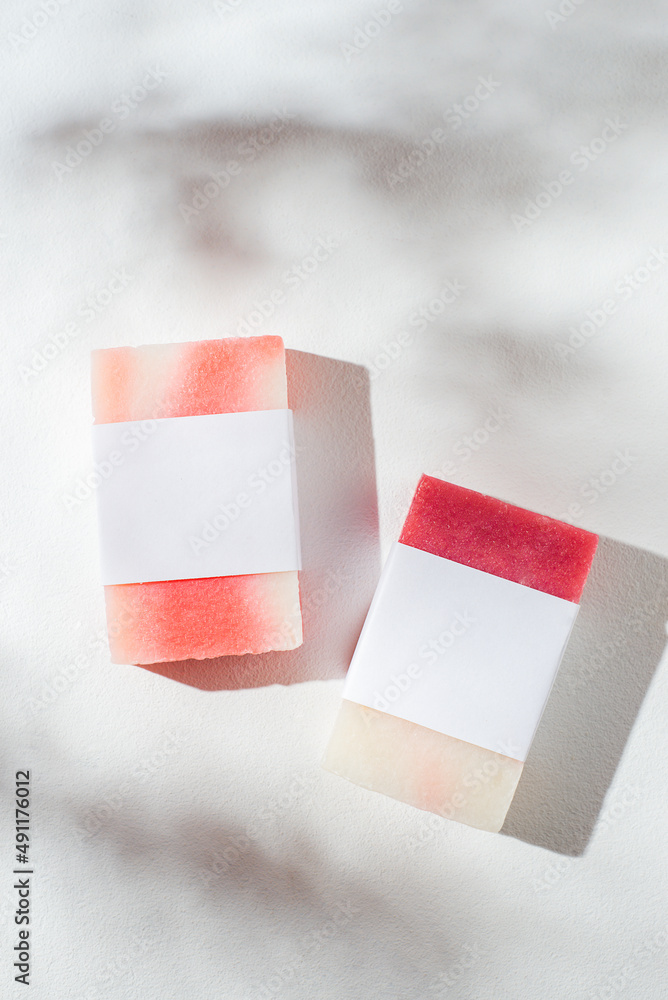 Two bars of homemade soap with labels on a white background. Mockup for ...