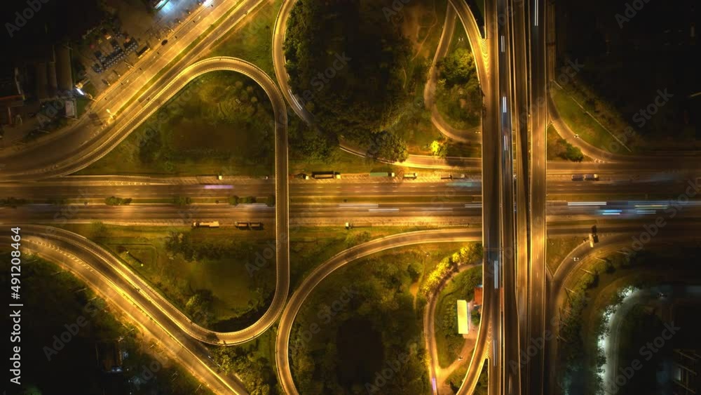 4K : Aerial Hyper lapse drone view of road junction with moving cars ...
