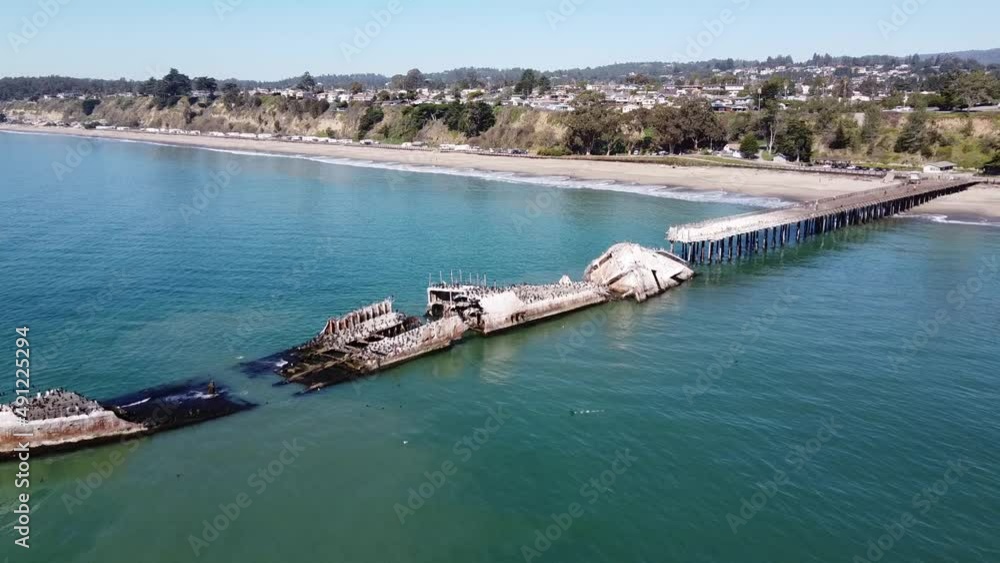 Santa Cruz town with wooden pier and sunken concrete SS Palo Alto ...