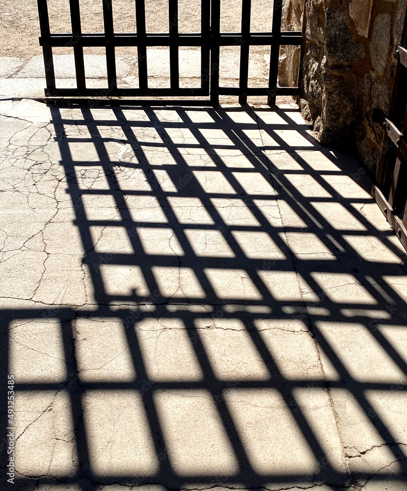 Old prison cells with weathered metal bars and stone walls Stock Photo ...